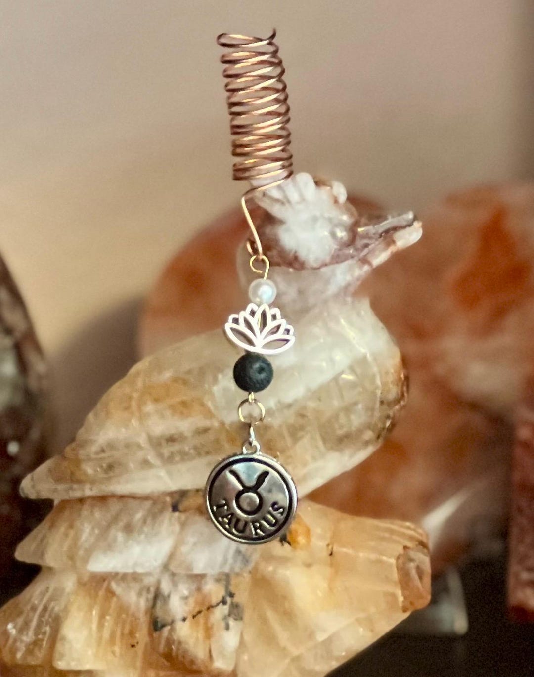 Taurus Zodiac Braid Coil With Lava Bead, Lotus Charm & Aromatherapy ...