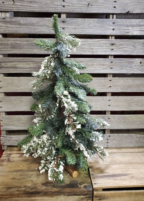 Small flocked christmas tree store