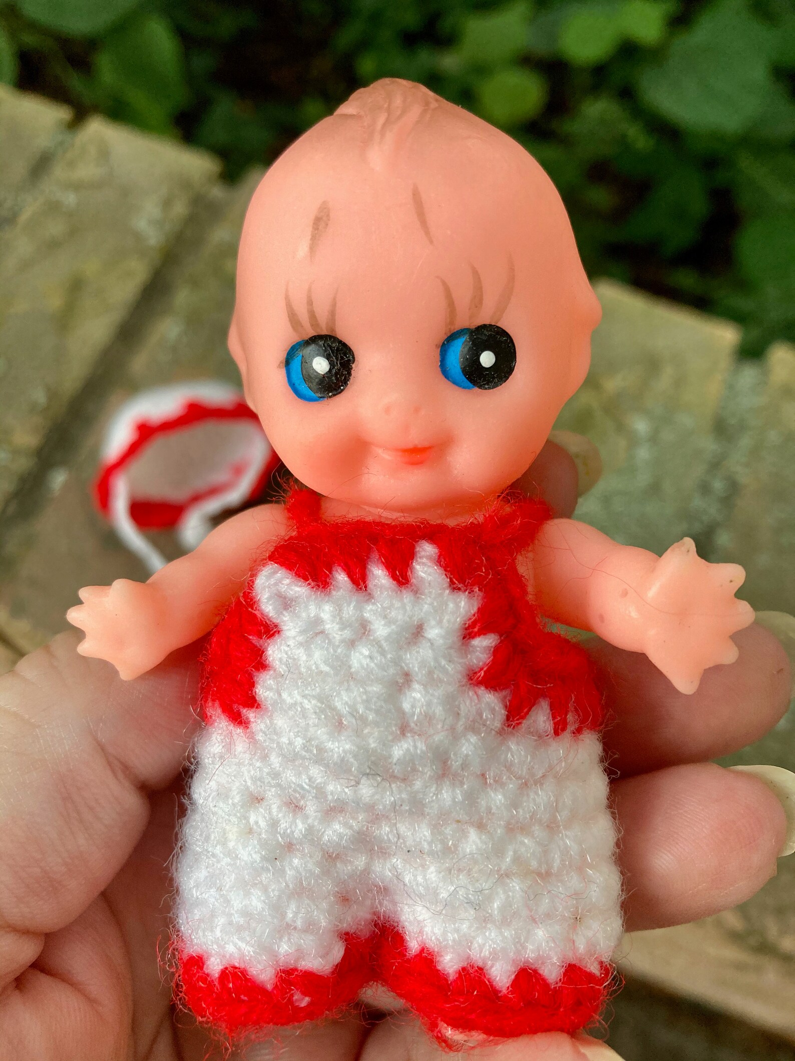 Kewpie Doll In Crocheted Outfit And Hat Plastic Or Rubber Toy Figurine