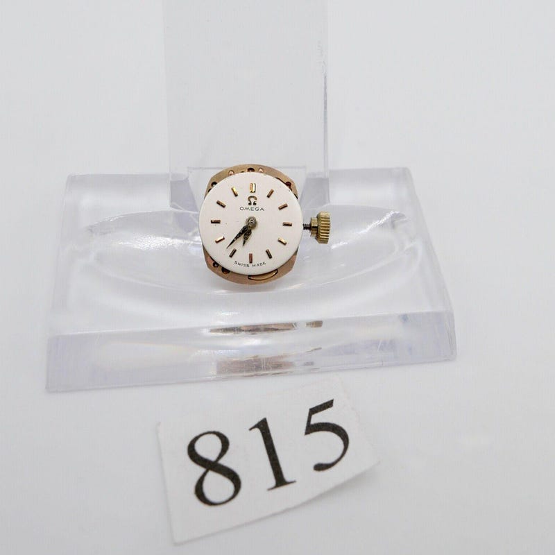 Omega Wall Clock - Etsy UK