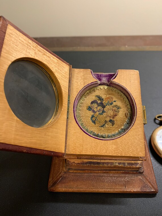 Bible in the podium pocket watch nightstand with Illi… - Gem