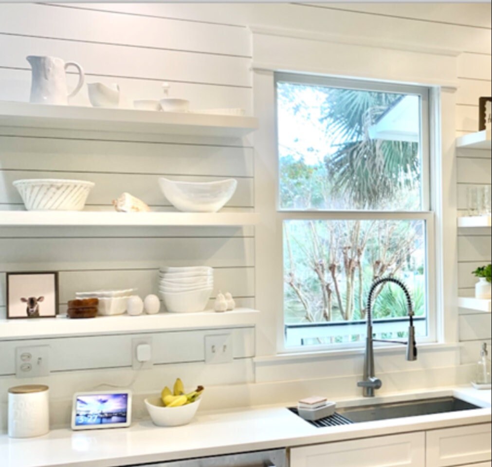 Thin white floating shelves store