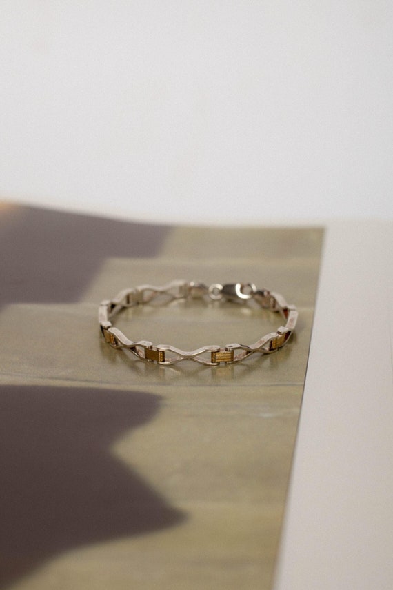 Nrq mixed metal goldtone - Gem