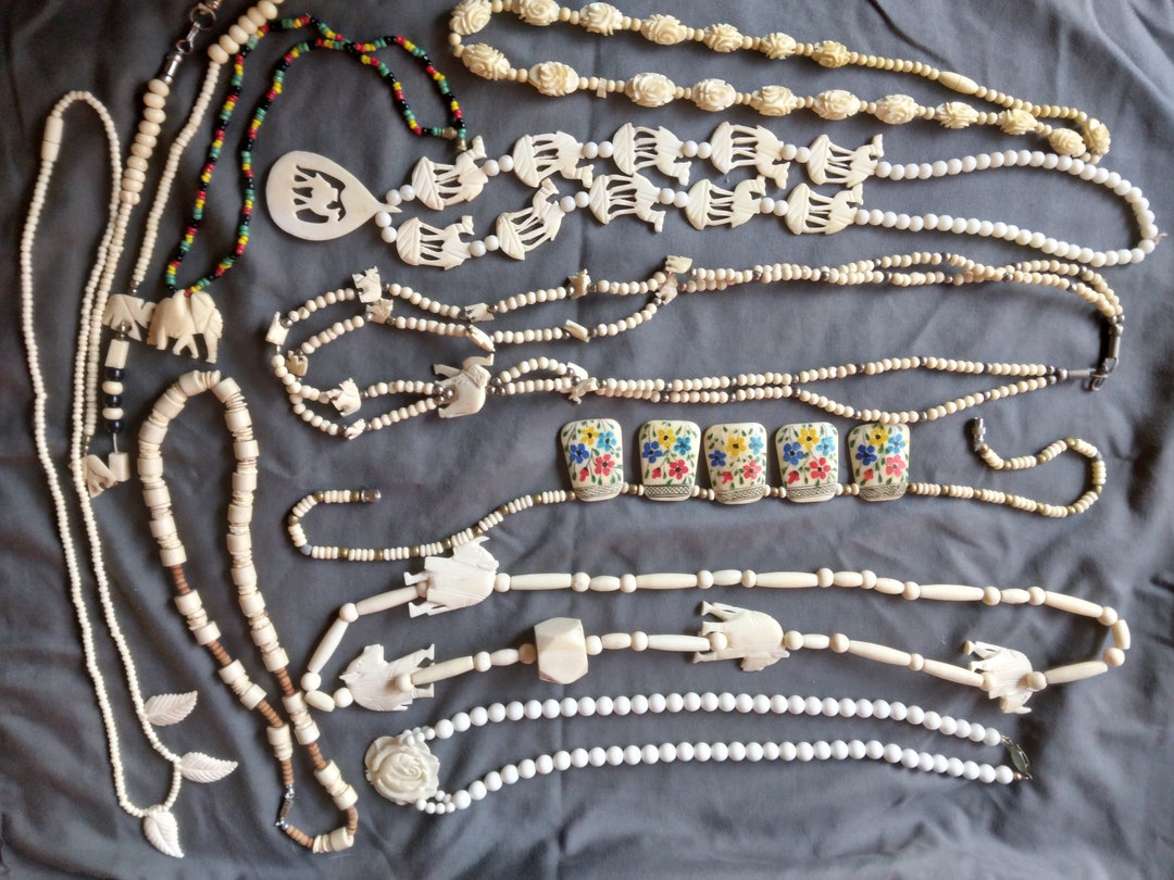 9 Piece Lot Vintage Carved Creamy Ivory Bone Colored Carved Necklaces Pendants Camels Roses ...