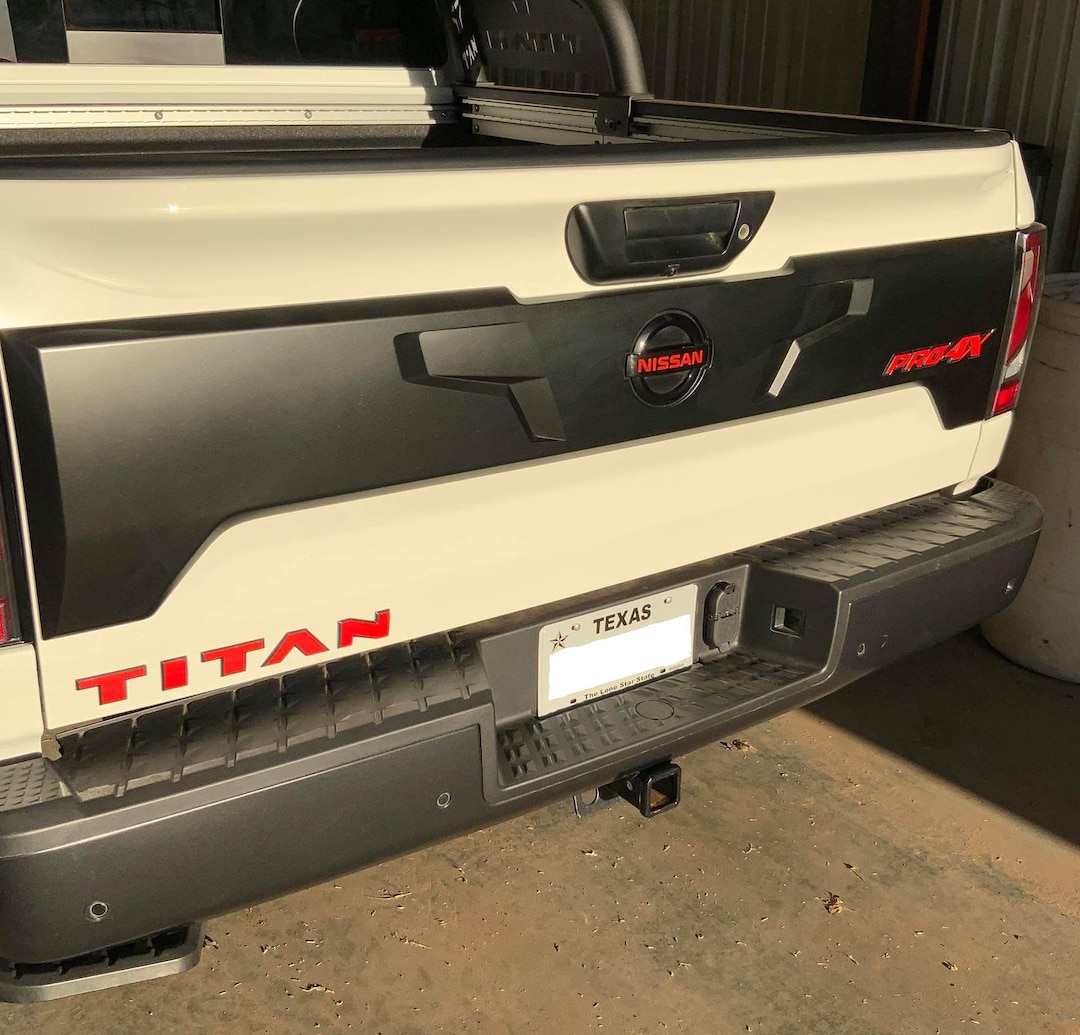 Nissan titan tailgate emblem store