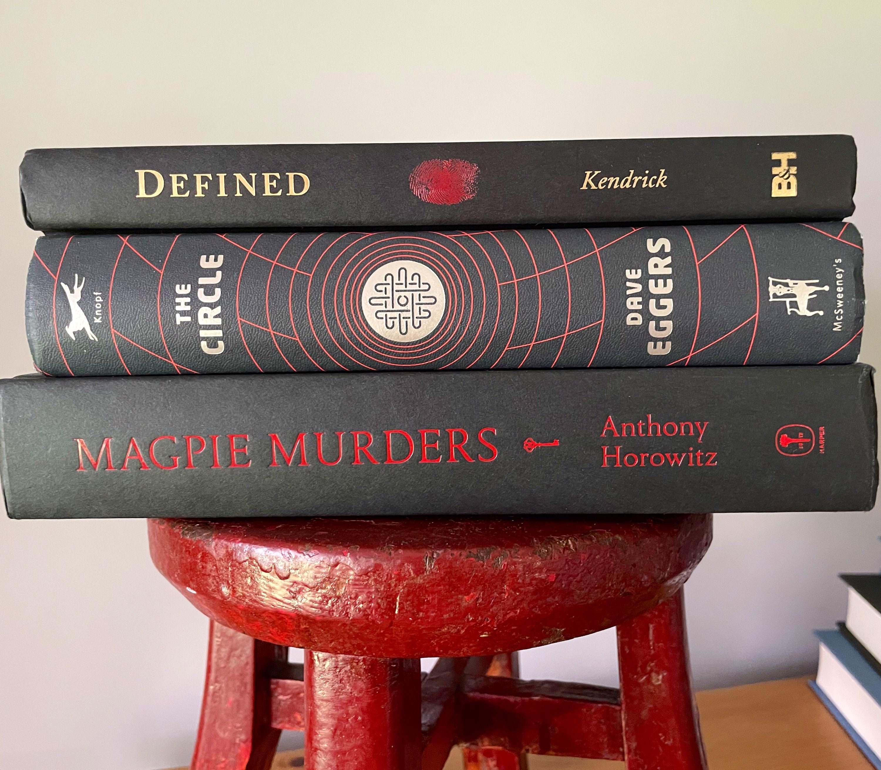 Artsy set of black deep red books for staging | Etsy