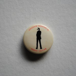 Vintage Graham Parker is Radioactive Pin Back Button - Rock New Wave ...