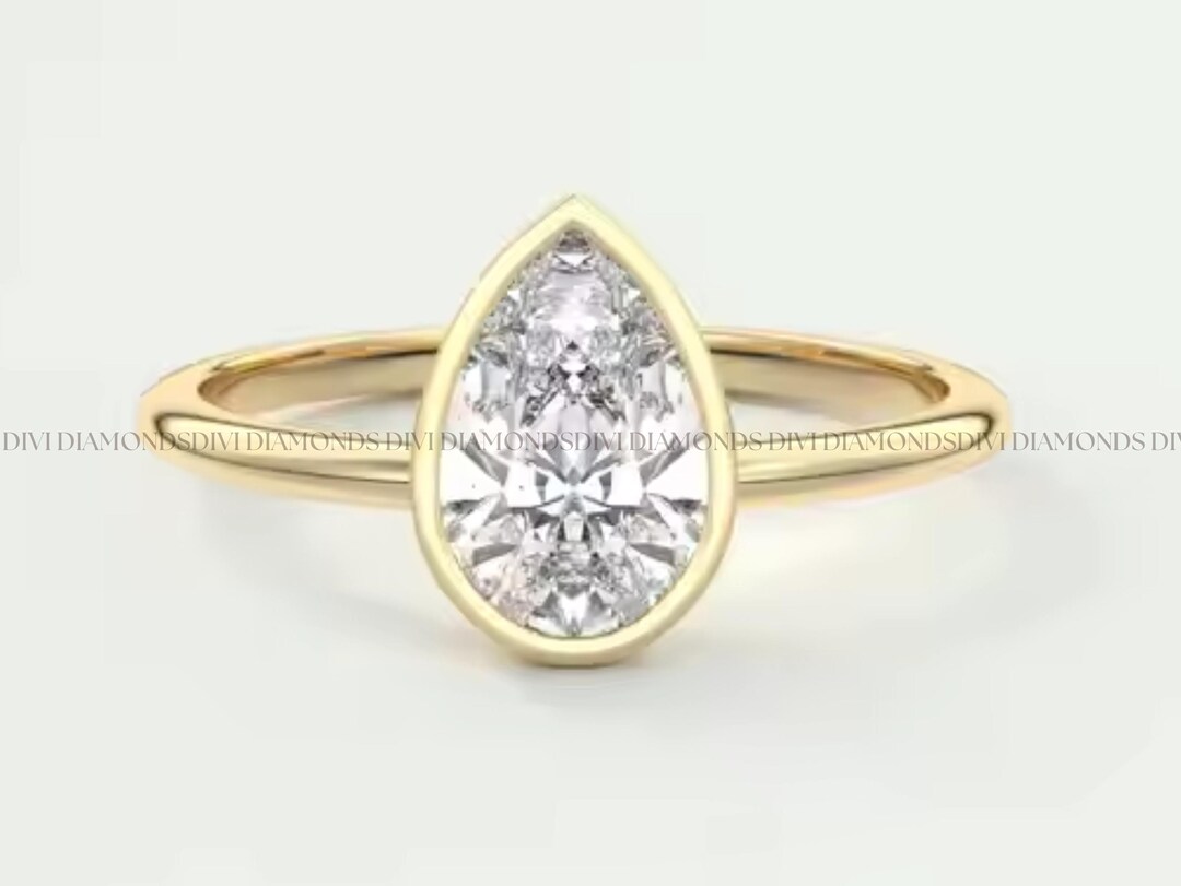 Bezel Set Pear Cut Moissanite Ring, Modern Pear Shaped Engagement Ring ...