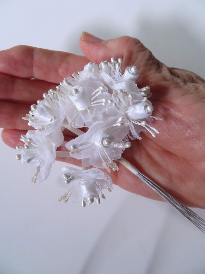 White Color Flowers With White Wrapped Fabric Center Bead With Wire ...