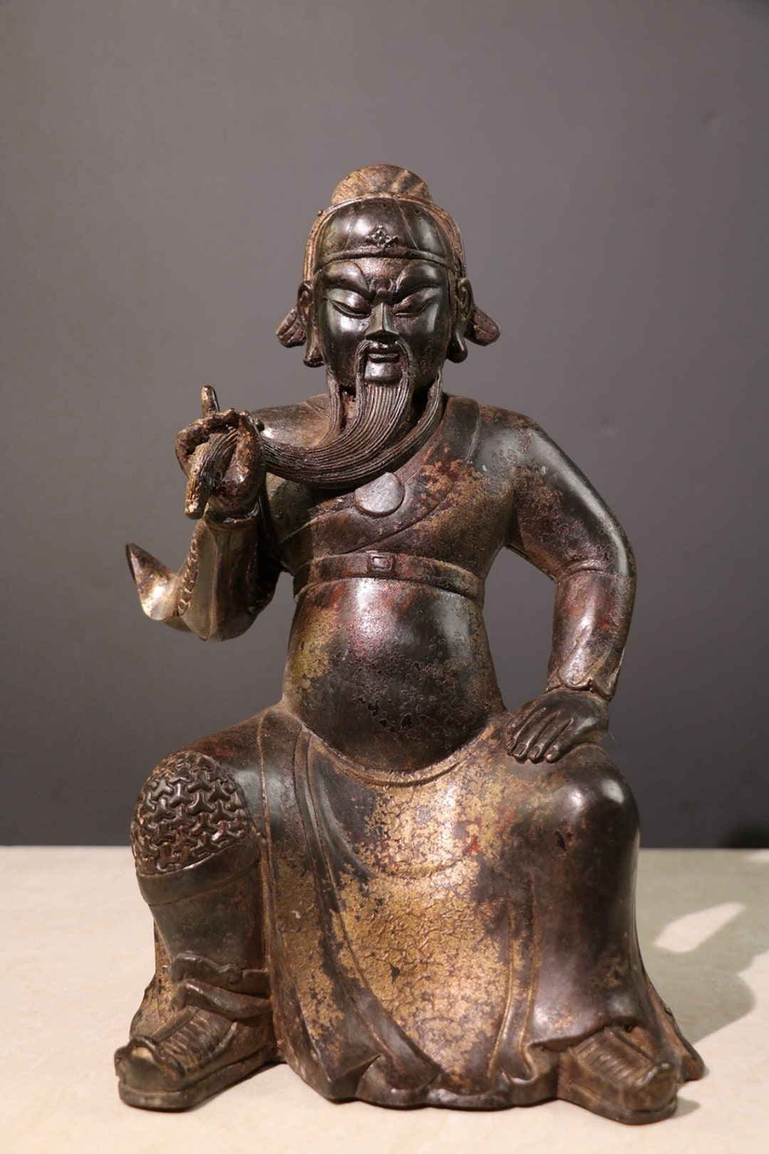 A Statue of the Buddha Statue of Wu Caishen, Guan Erye, and Guan Gong ...