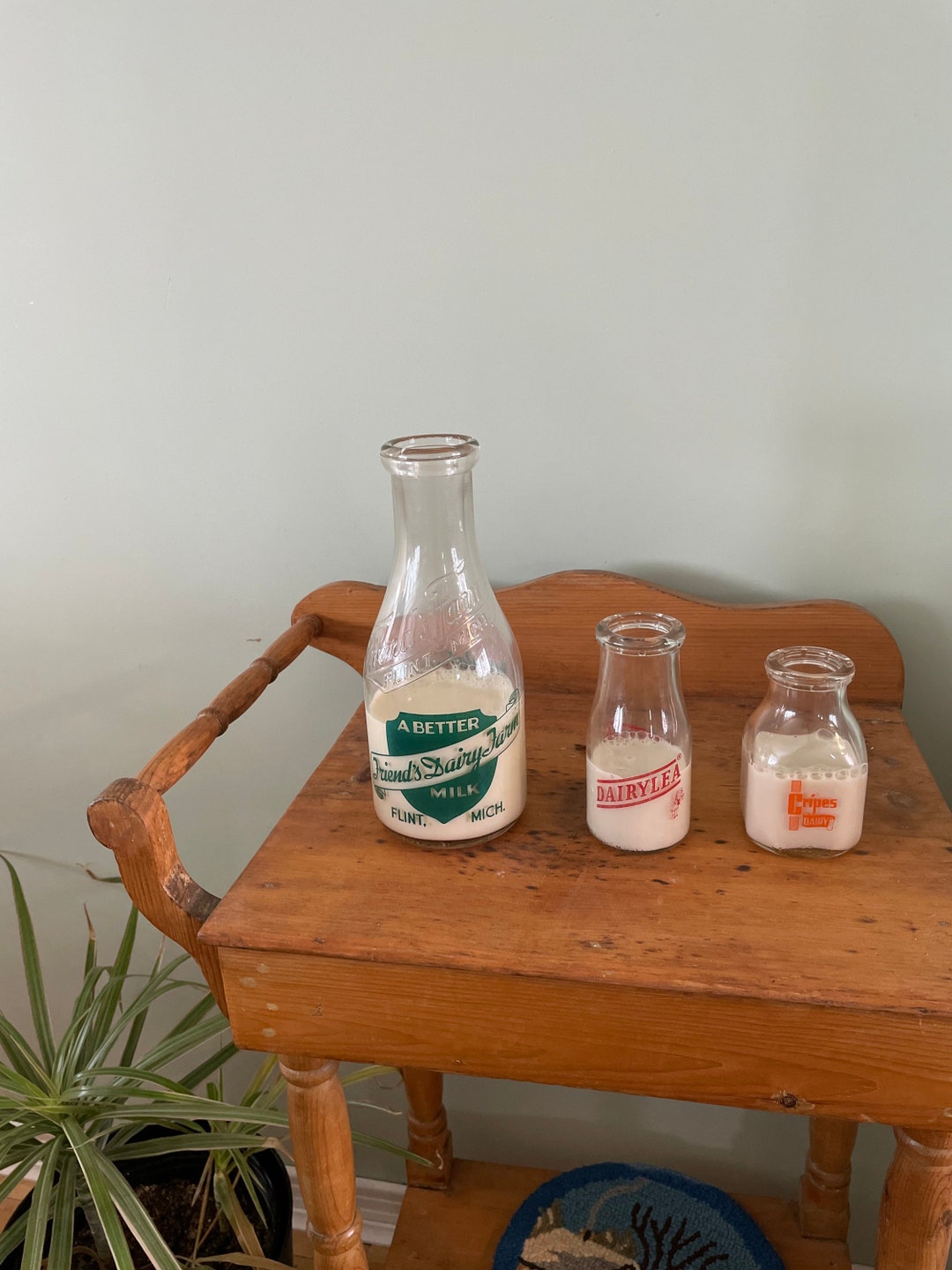 A Small Collection of 3 Embossed Vintage Milk Bottles From the Mid 20th ...