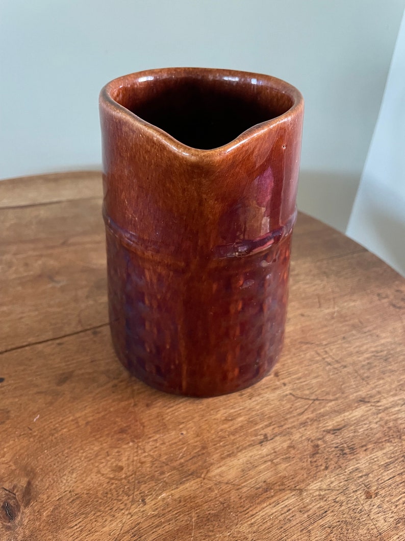 A Very Attractive Bennington Type Milk Pitcher With a Basket Weave ...