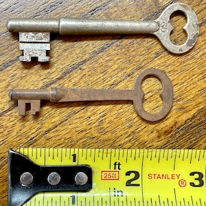 2 Authentic Vintage Embossed/stamped Skeleton Keys - Etsy