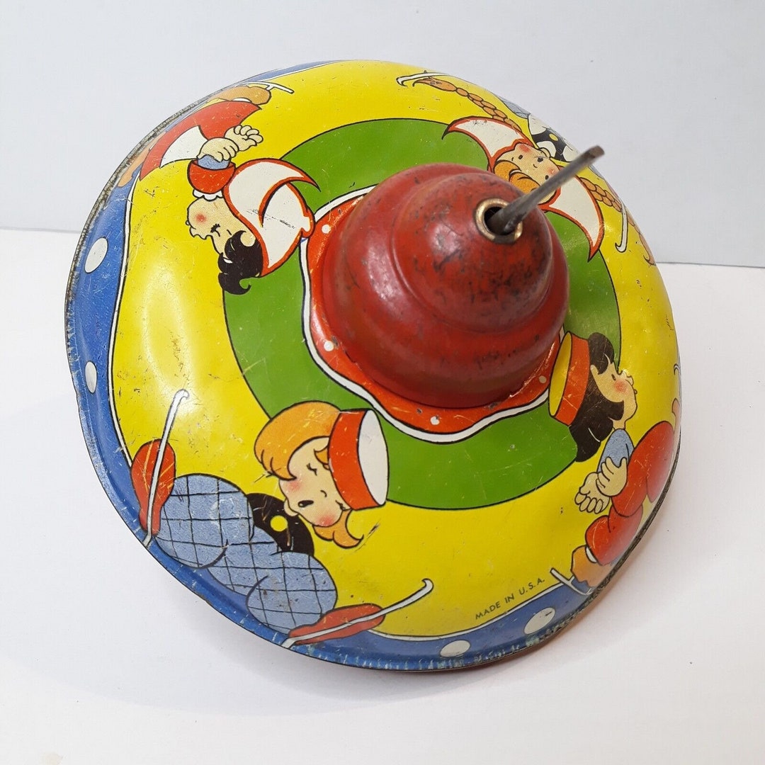 Pump Tin Spinning Top Toy Dutch Boy & Girl Skaters Lithograph C1950s ...