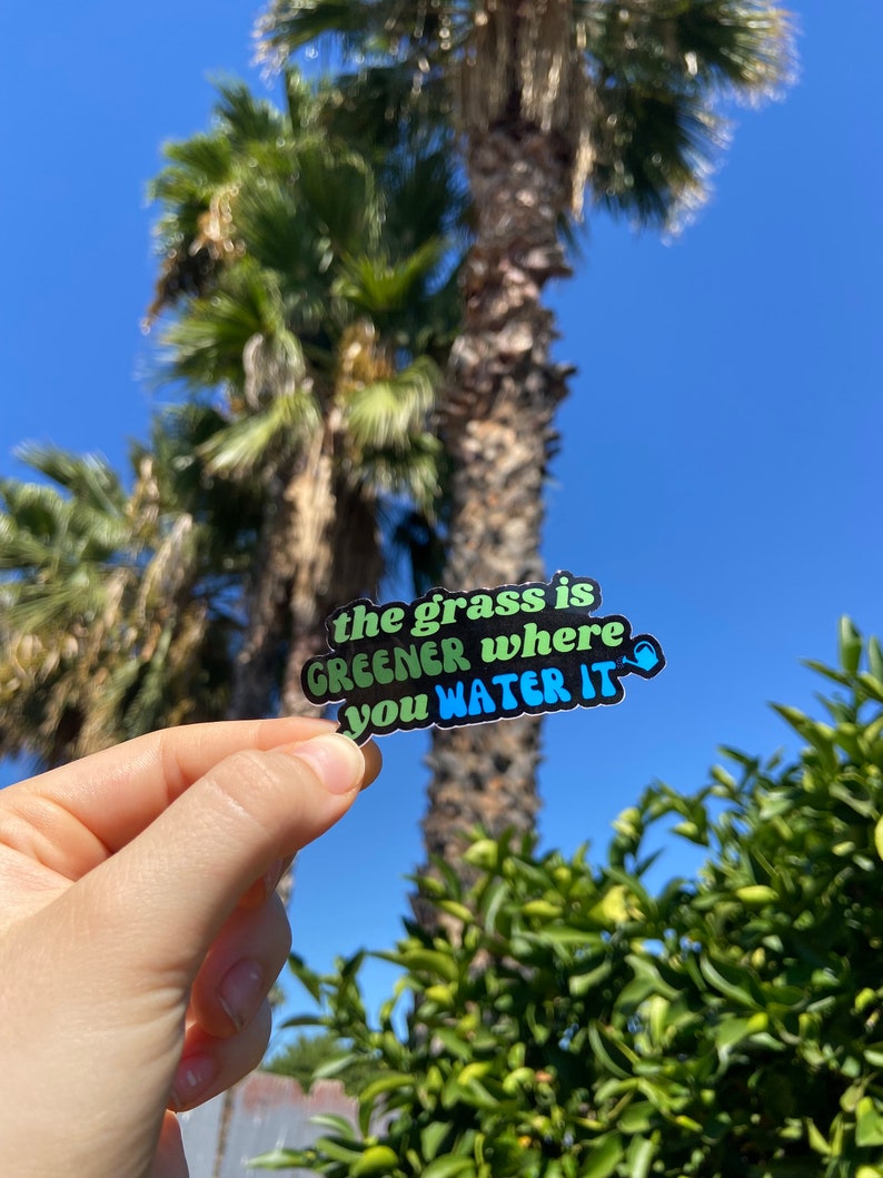 The Grass is Greener Where You Water It Sticker | Inspirational Quote ...