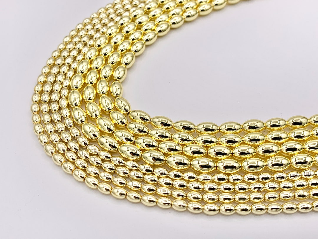 Hematite Puffy Rice Shape Shiny Beads | Real 18K Gold Plated Stone ...