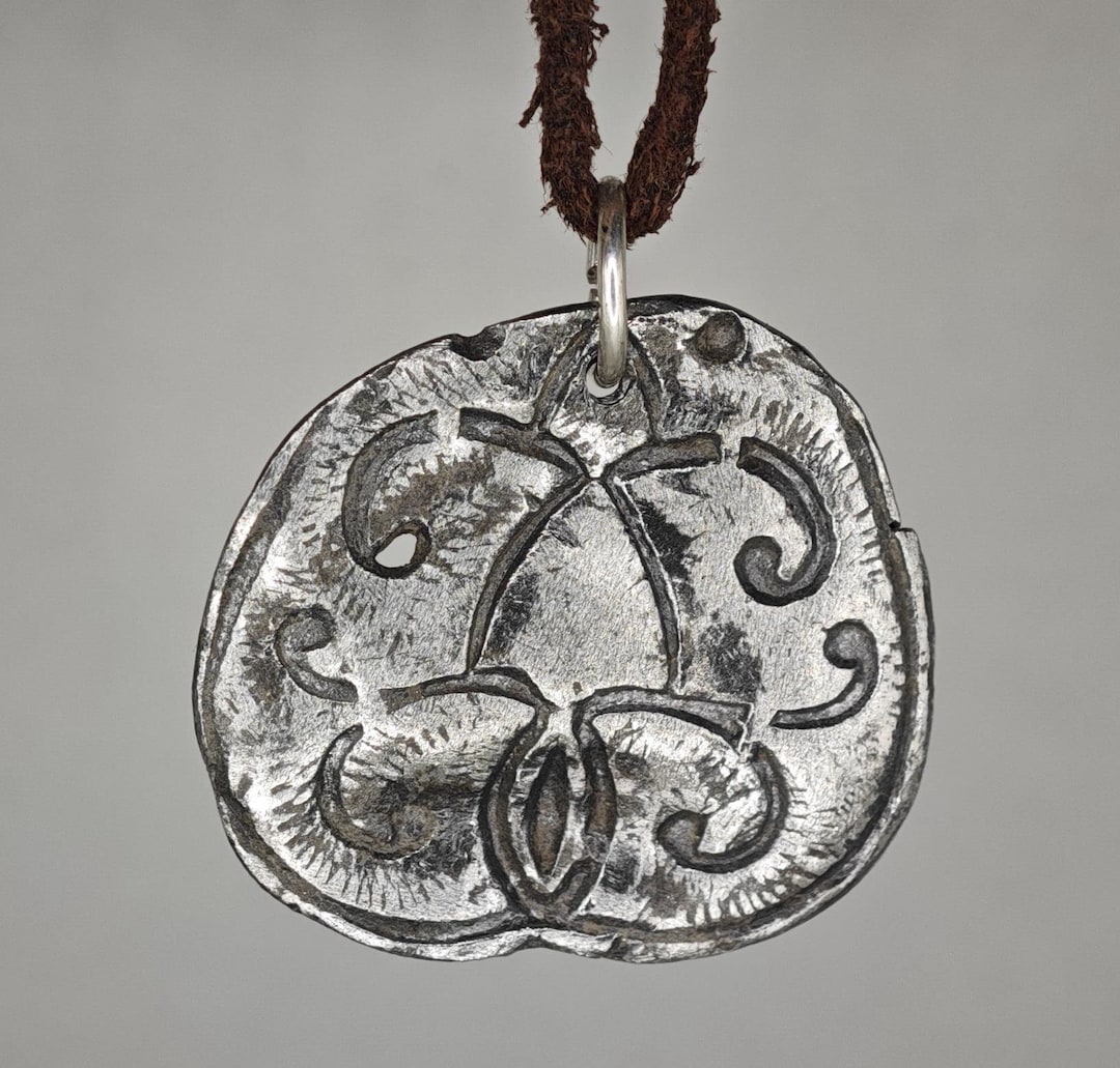 Ancient Medieval Amulet in the Form of a Lily. Ancient Amulet. Antique ...