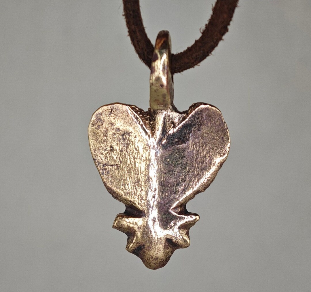 Ancient Viking Amulet With a Heart. an Ancient Amulet. Antique Viking ...