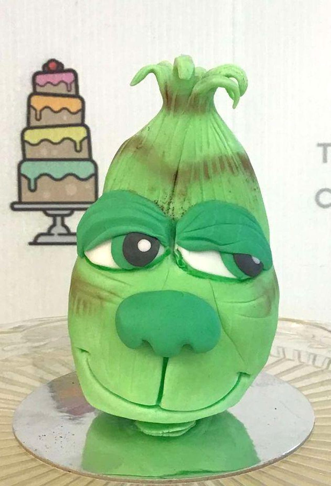 Really Cute Grinch Head Made With Edible Fondant and Inside a Cadbury's ...