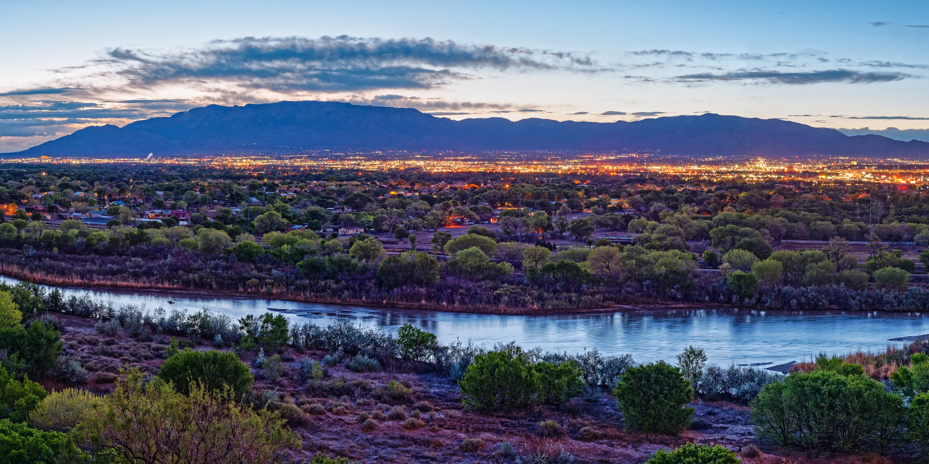 Twilight Panorama of Sandia Mountains, Albuquerque Skyline, and Rio ...