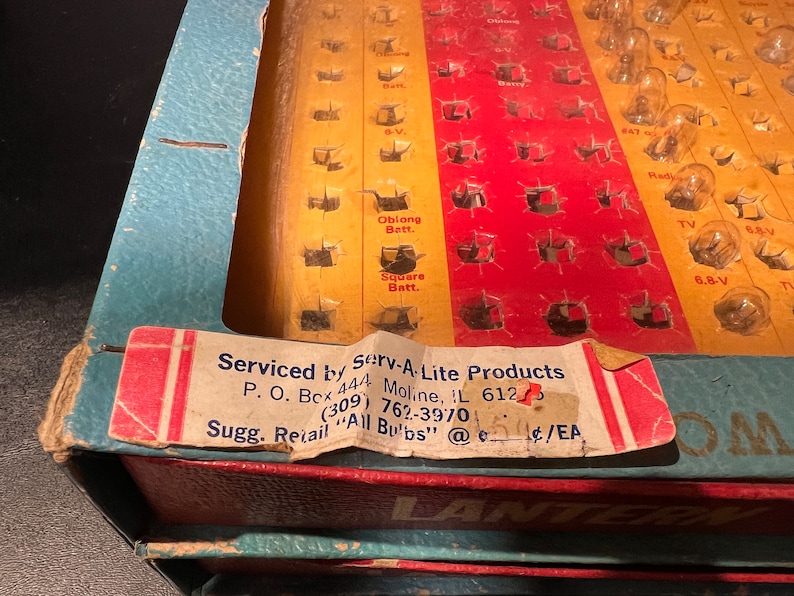Vintage Hardware Store Display of Light Bulbs Duo-tint Bulb & Battery ...