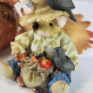 Charming Little Piggy Figurine Features a Pig Dressed as a Scarecrow ...