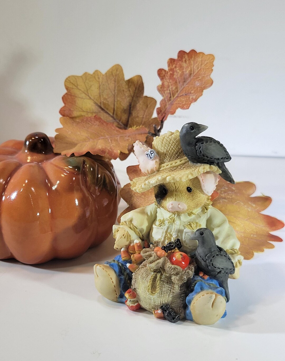 Charming Little Piggy Figurine Features a Pig Dressed as a Scarecrow ...