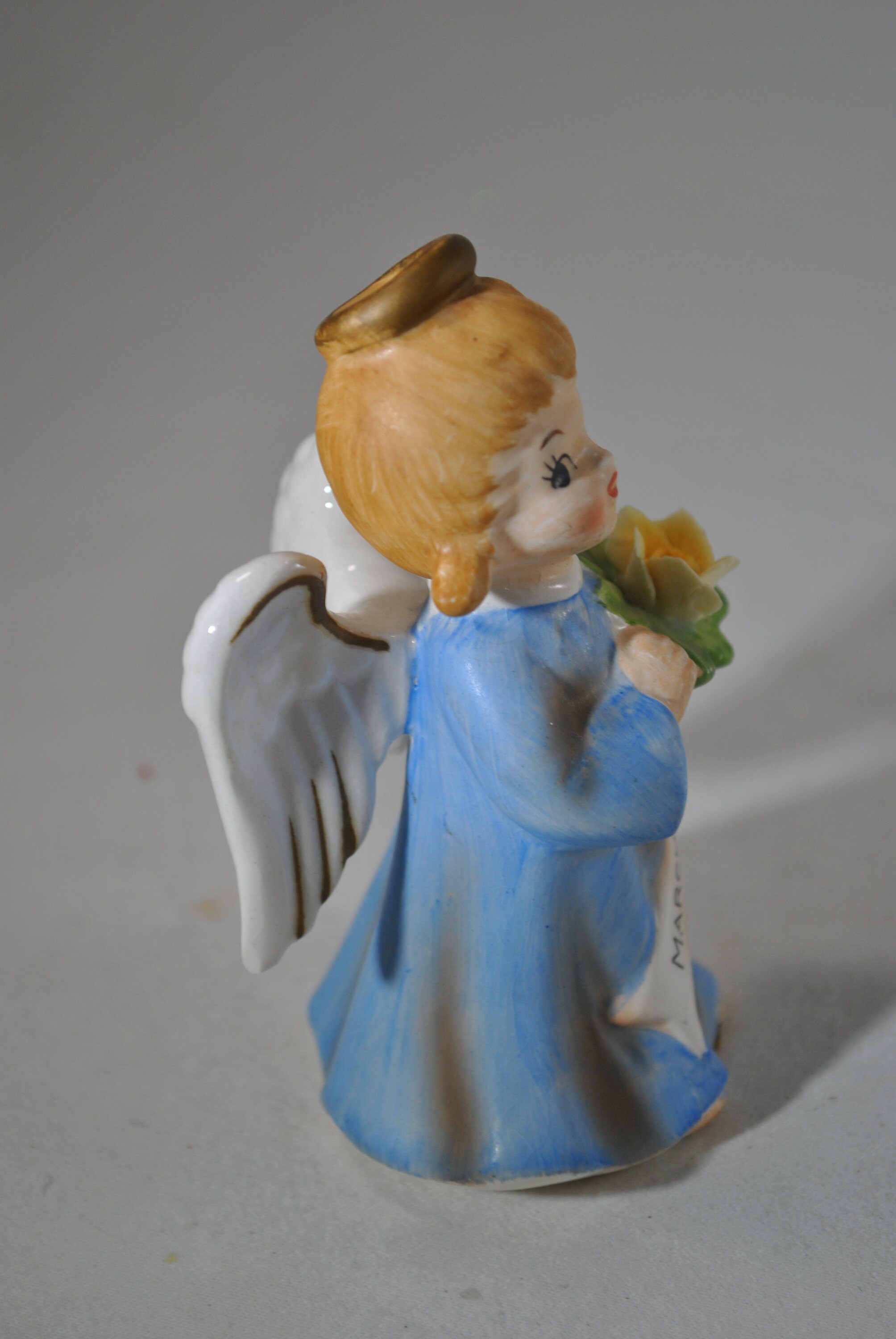 Lefton March Angel in a Blue Dress With White Sash and Big Yellow ...