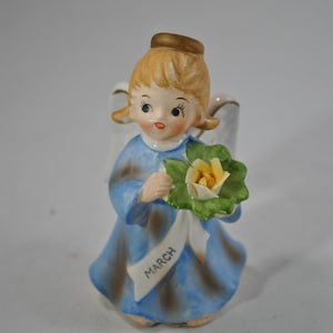Lefton March Angel in a Blue Dress With White Sash and Big Yellow ...