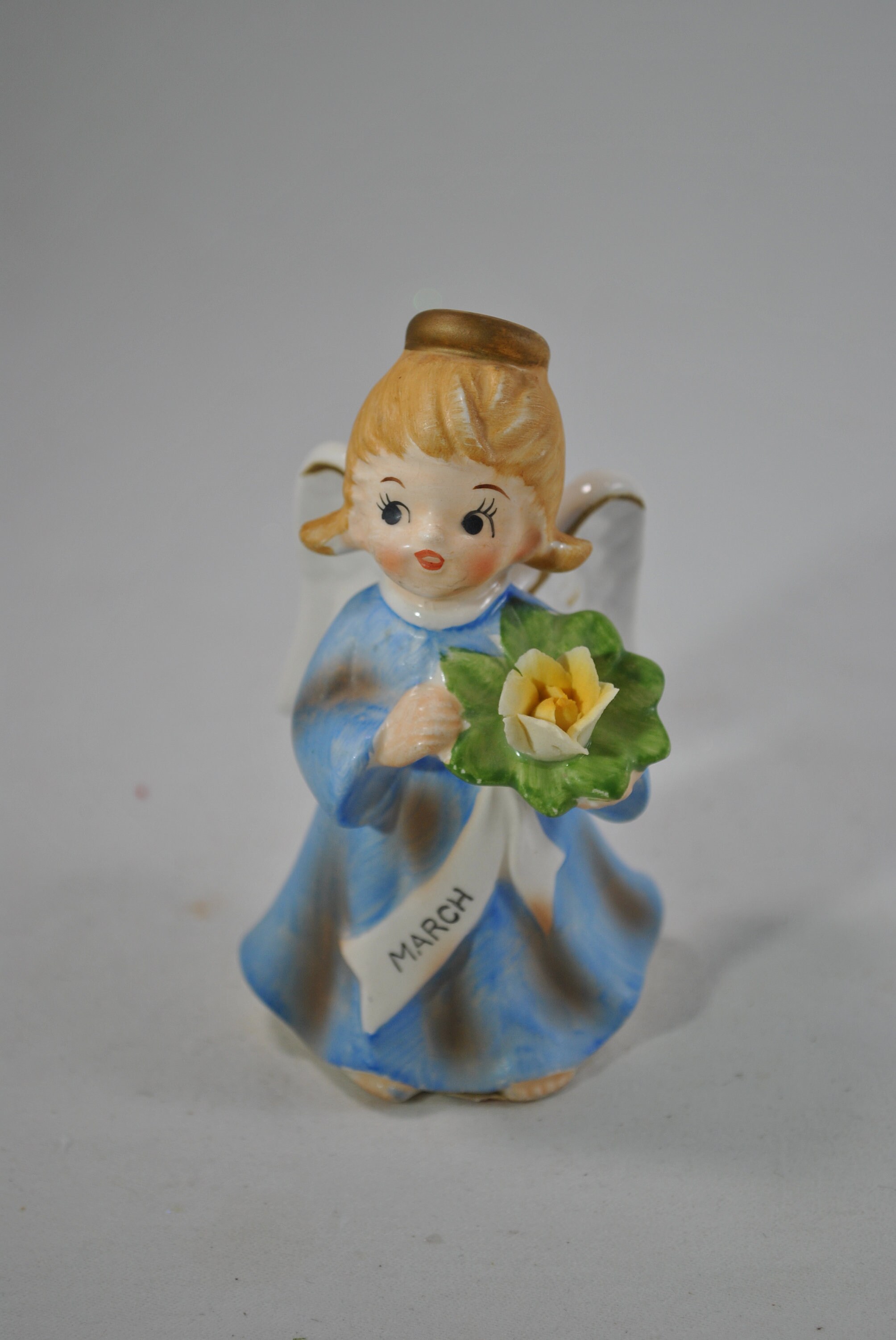 Lefton March Angel in a Blue Dress With White Sash and Big Yellow ...