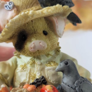 Charming Little Piggy Figurine Features a Pig Dressed as a Scarecrow ...