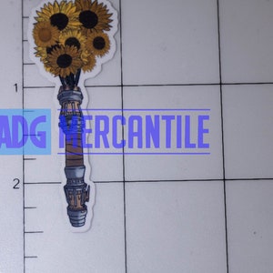 LS26 Rey Skywalker Lightsaber With Yellow Sunflowers Star Wars Flowers ...