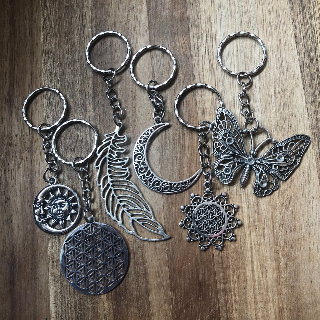 Llaveros 1 / 2 • sol y luna, pluma, mariposa, mandala, luna, flor de la ...