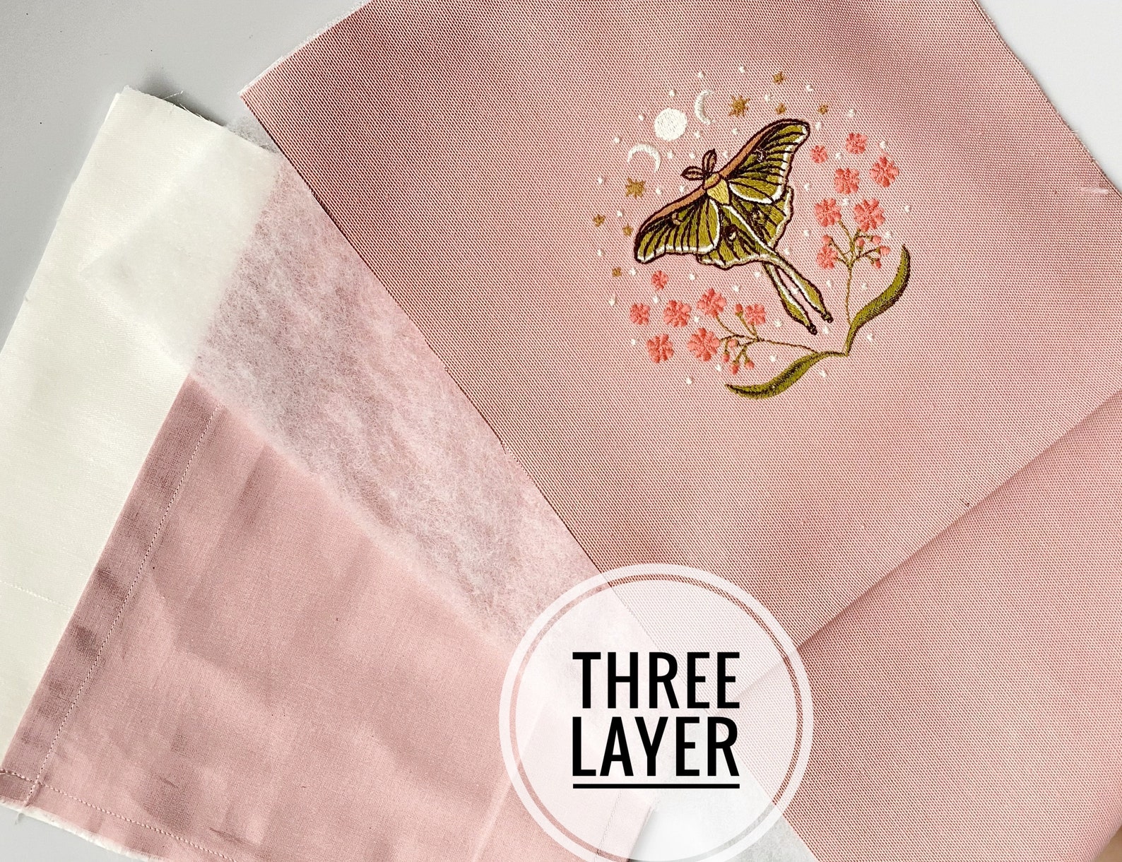 Book Sleeve With Green Moth Embroidery Design on Waterproof Pink Fabric ...