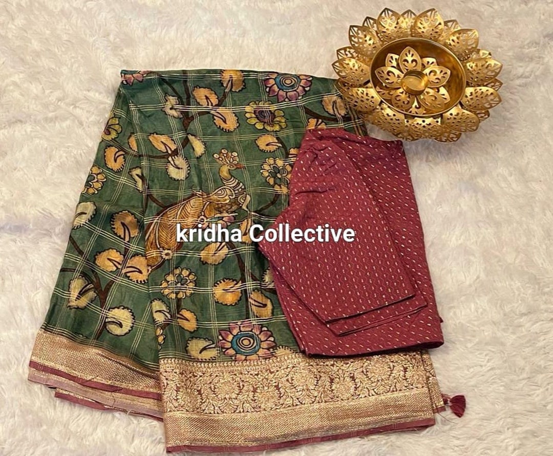 Green Shade Falling Dola Silk Kalamkari Print Saree With Foil Border ...