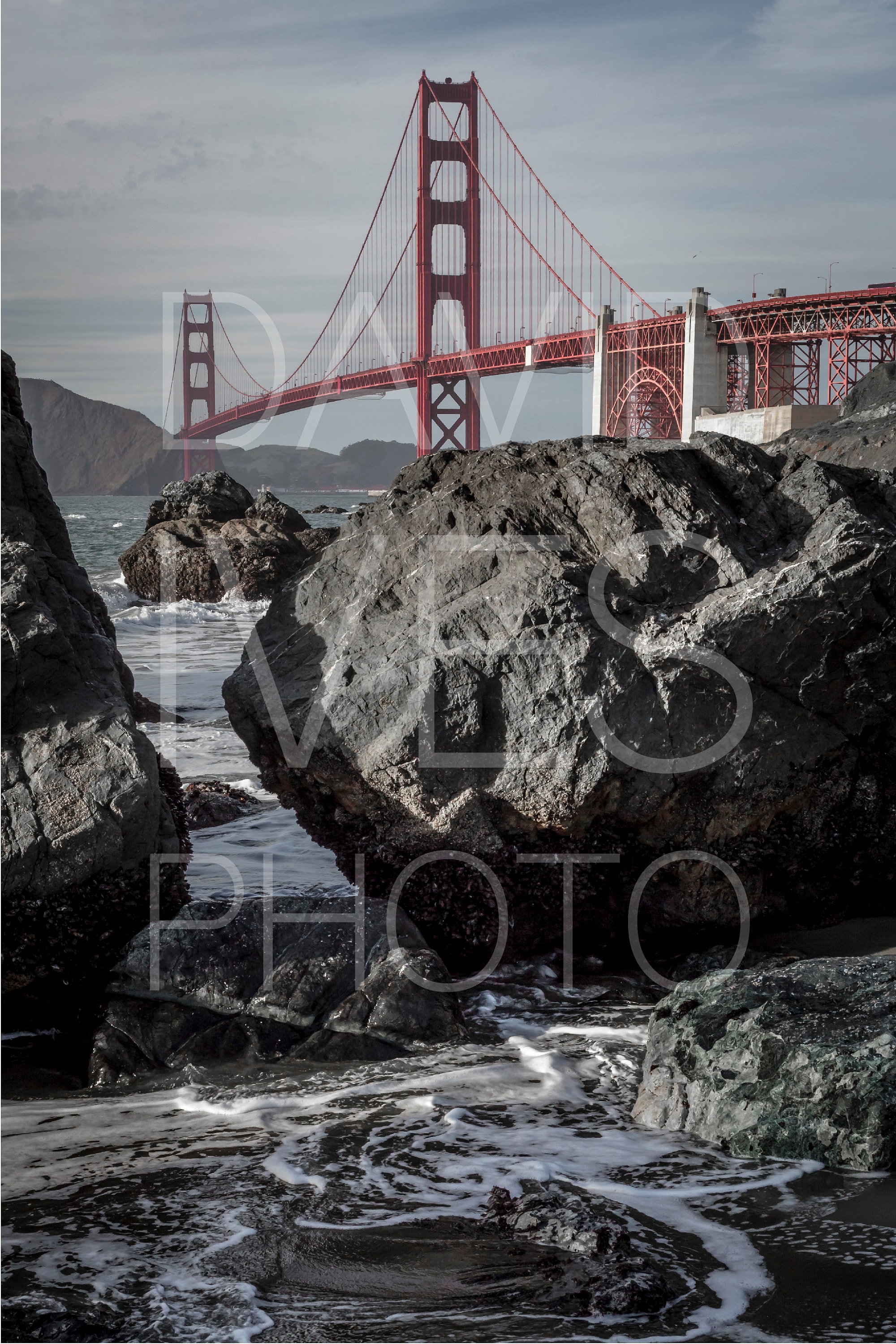 The Gilded Ages the Golden Gate Bridge Between Boulders on Baker Beach ...