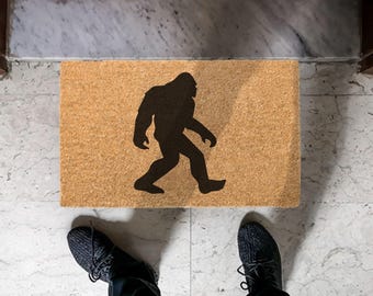 BIGFOOT SASQUATCH IN THE WOODS DOORMAT