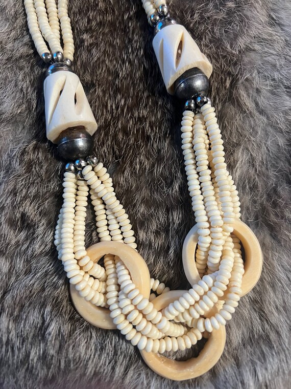 Tribal Style Abstract Twisted Bone and Circle Carved … - Gem