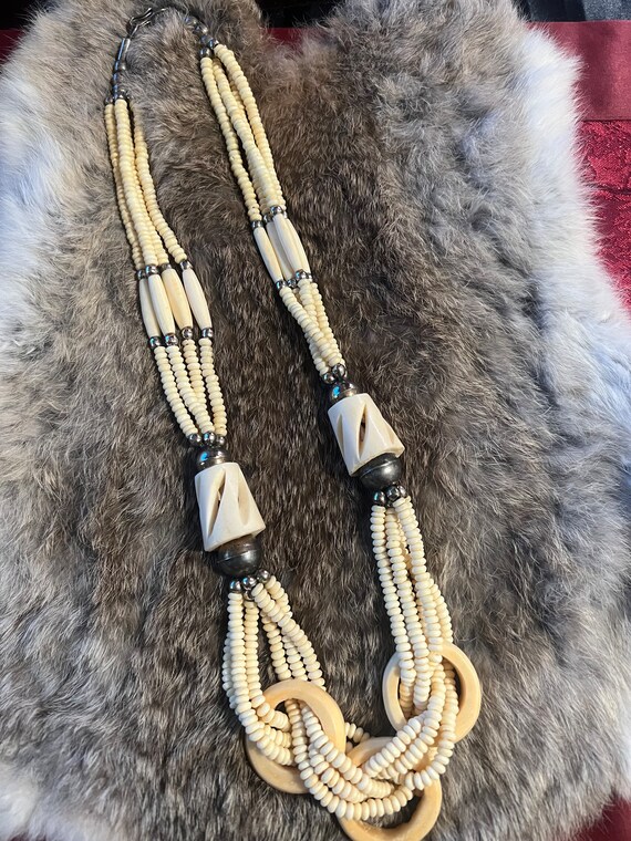 Tribal Style Abstract Twisted Bone and Circle Carved … - Gem