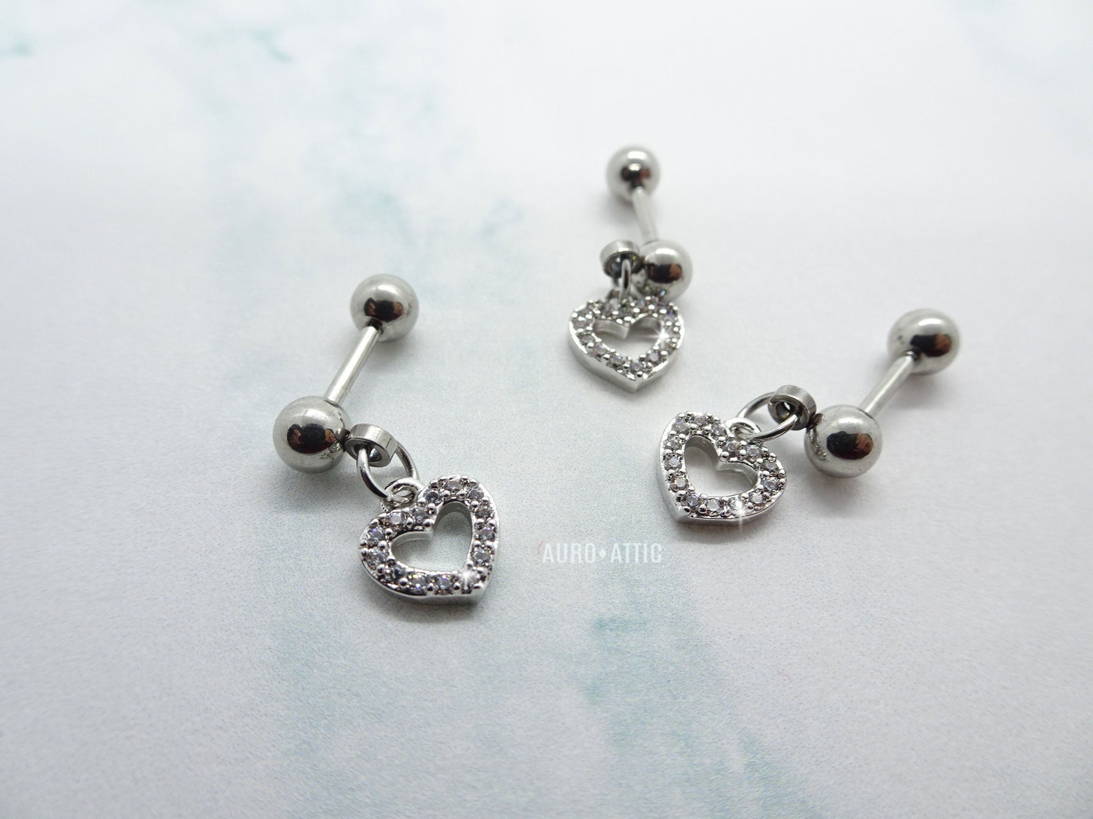 16G hanging heart ear piercingJinglingheart | Etsy