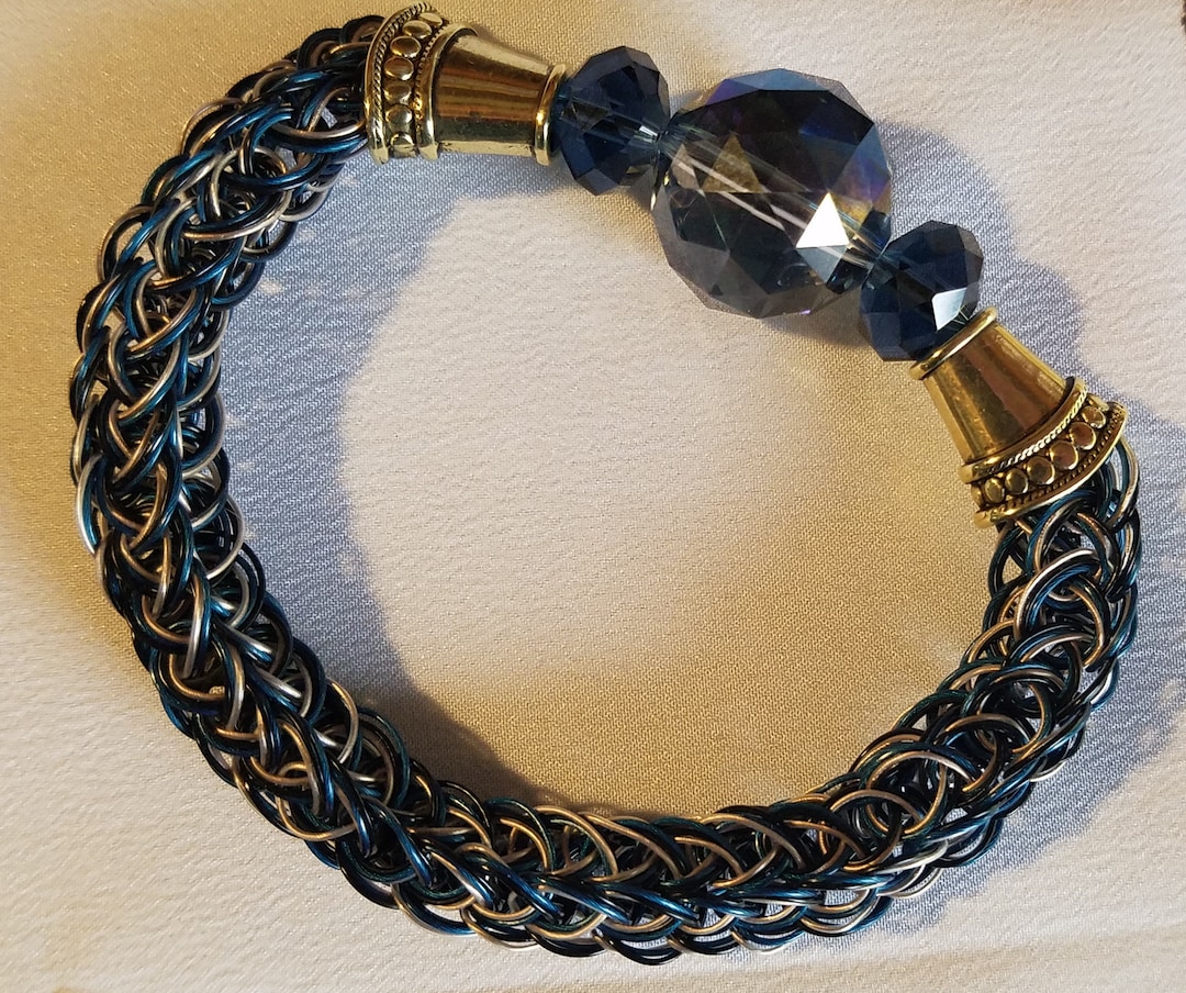 Beautiful Braided Wire Bracelet With Gold Tone End Caps and Jesse James ...
