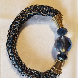 Beautiful Braided Wire Bracelet With Gold Tone End Caps and Jesse James ...