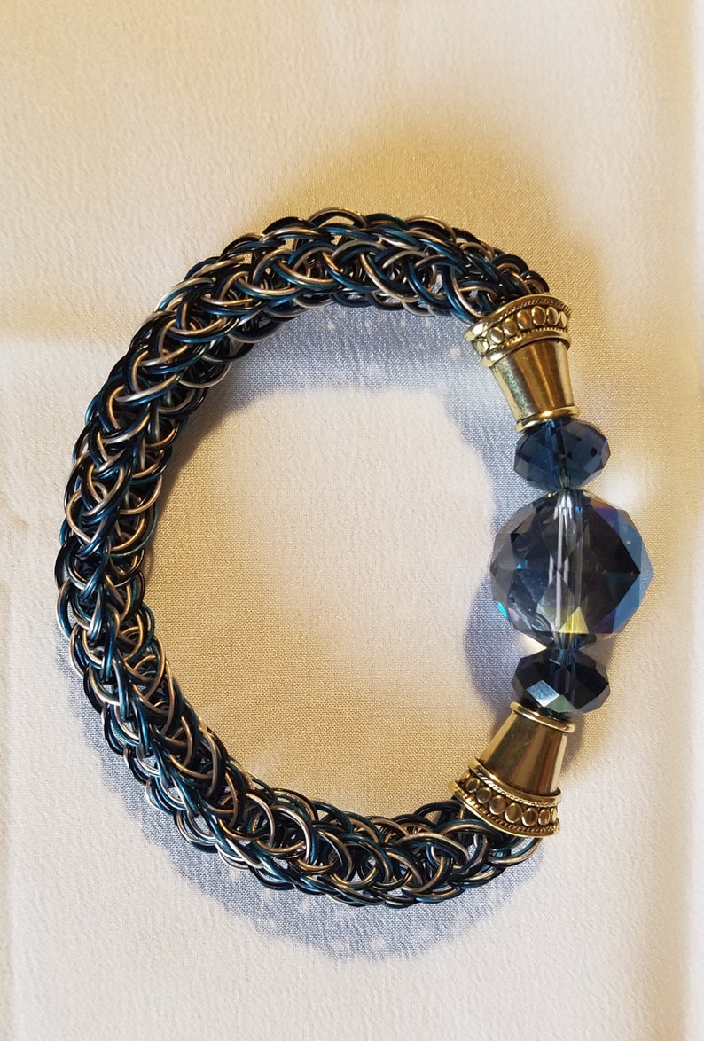 Beautiful Braided Wire Bracelet With Gold Tone End Caps and Jesse James ...