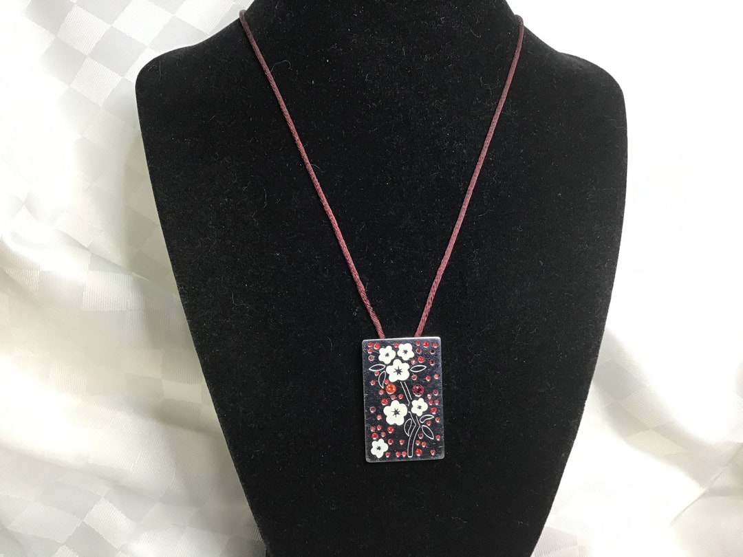 From Swatch. Beautiful Necklace With Silver Pendant Decorated With ...