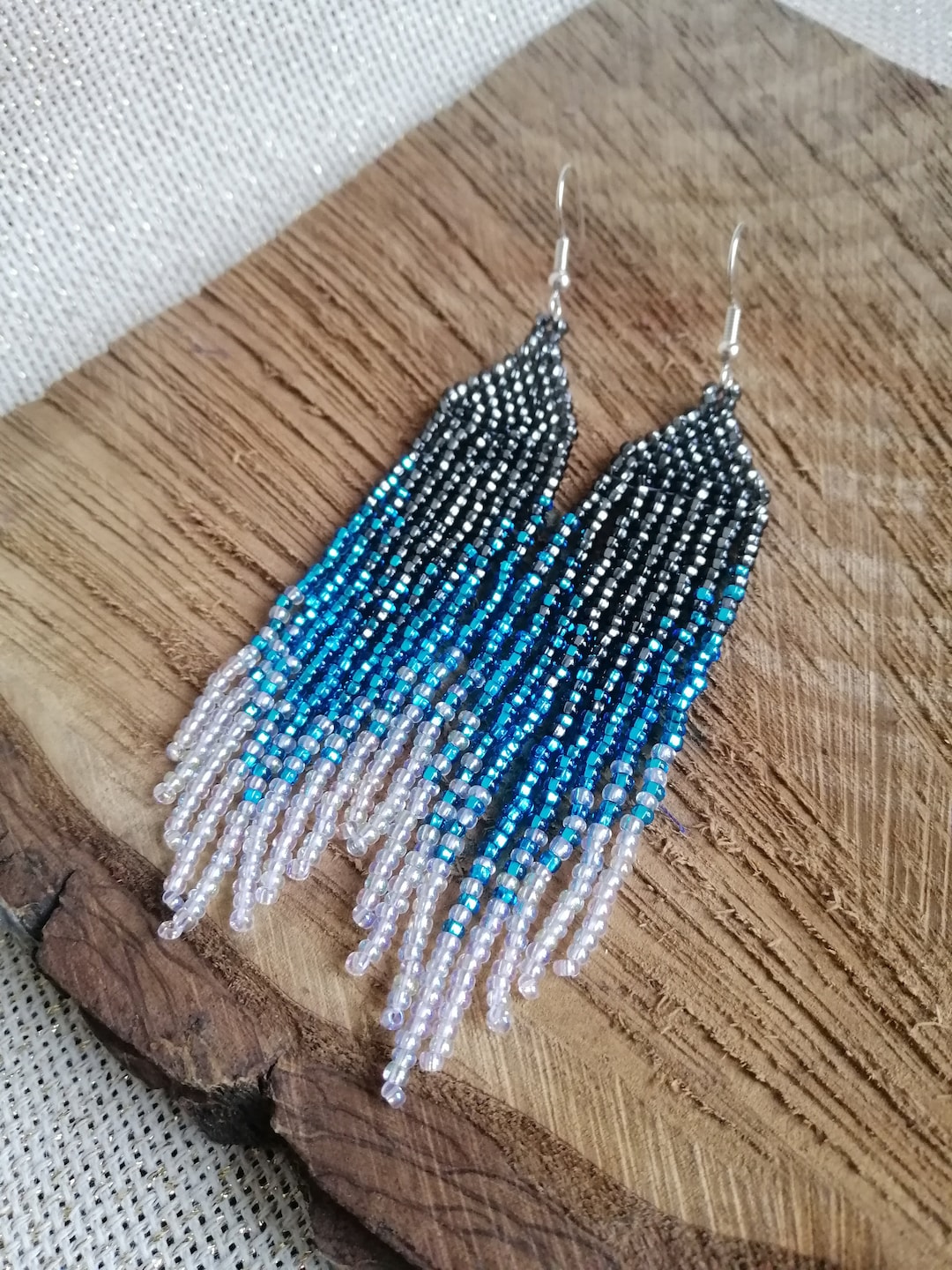 Pendientes de cuentas azules y blancas, gradiente de semillas largas ...