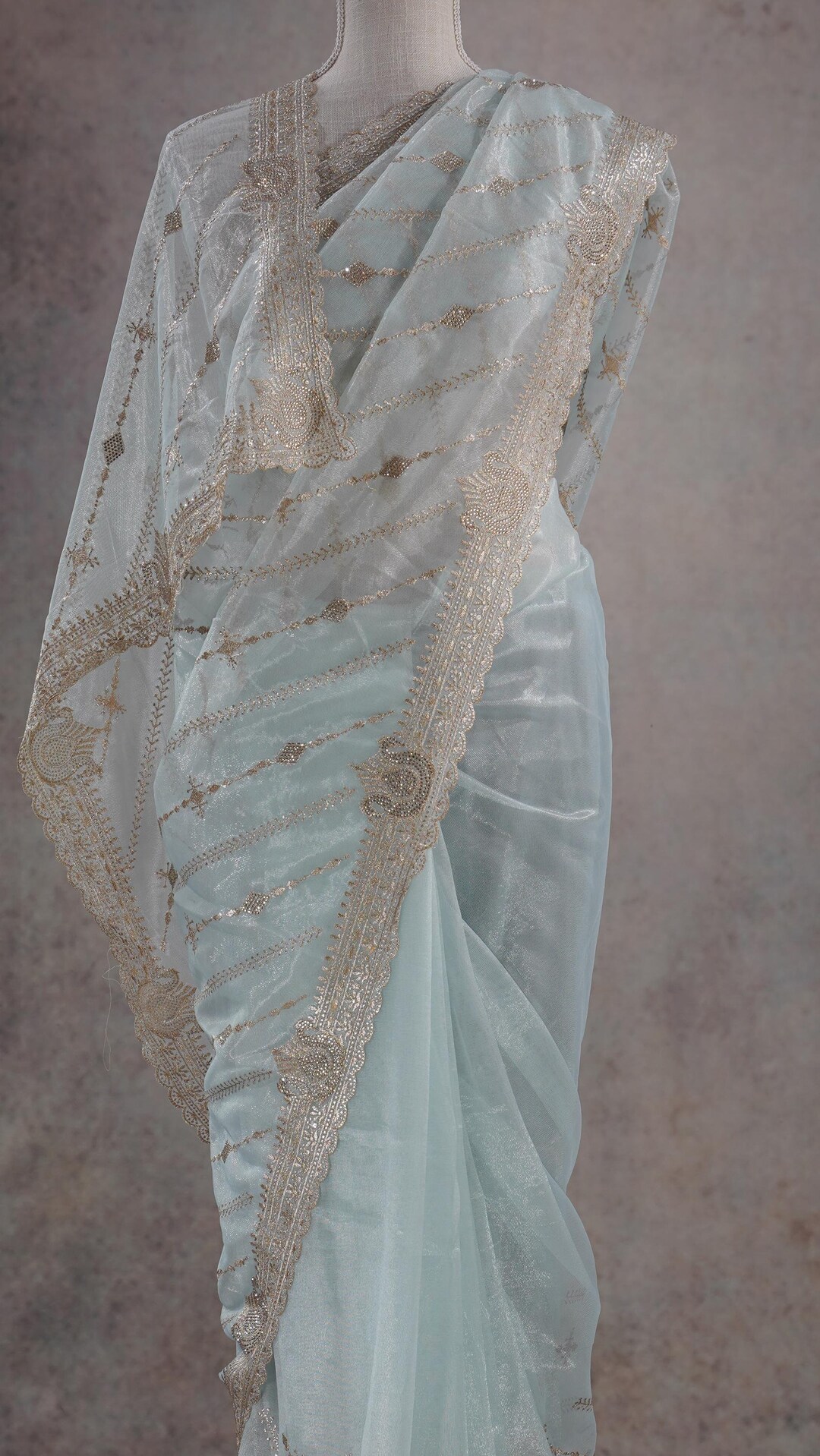 Light Blue Net Shimmer Saree With Gold Embroidery Work Blouse Fabric ...