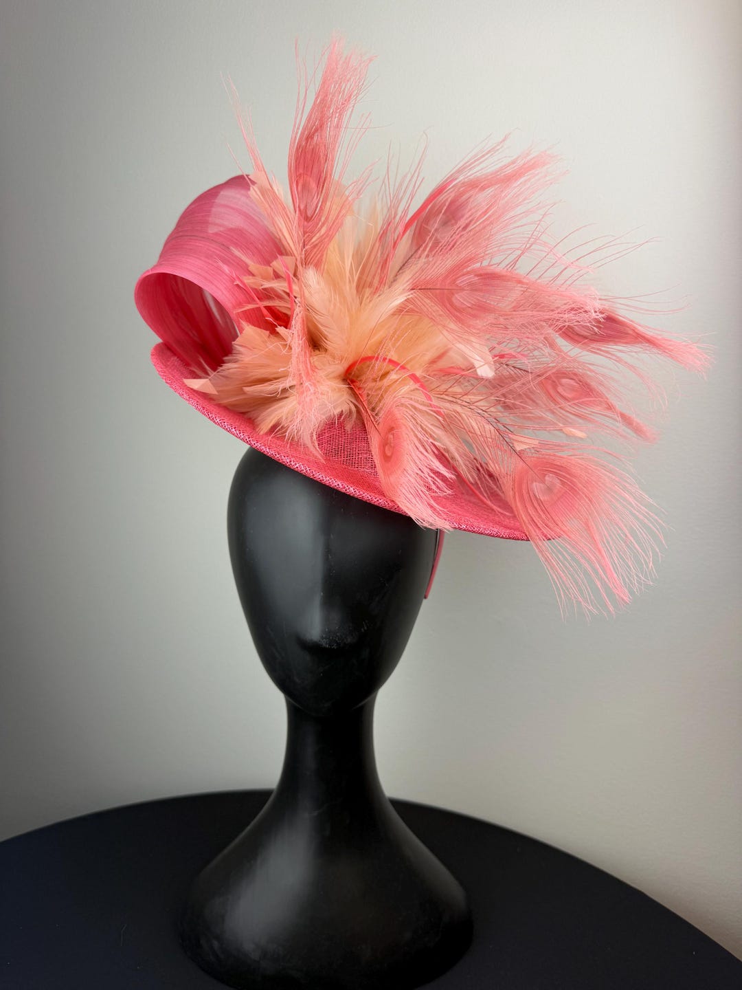 Coral Fascinator With Silk, Peach Feathers and Peacock Eyes 