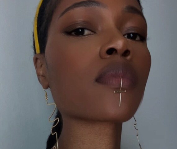 African Lip Piercing