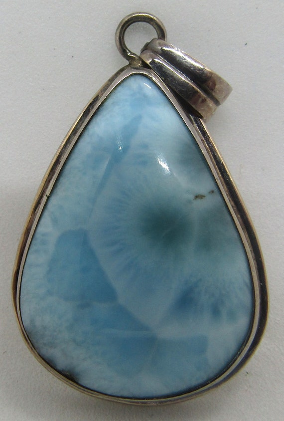 Blue circular and teardrop - Gem