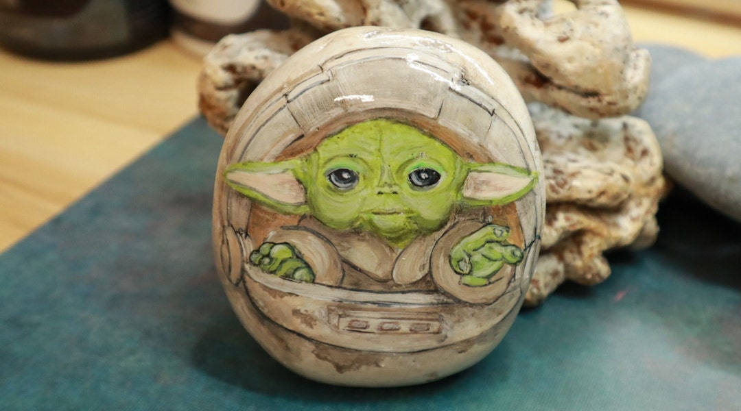 Baby Yodaaka Grogu in Crib Pod Fanart on Painted Rock. - Etsy